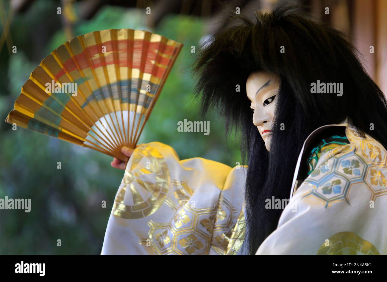 An artist performs a traditional Kagura or a scared dance dedicated to ...