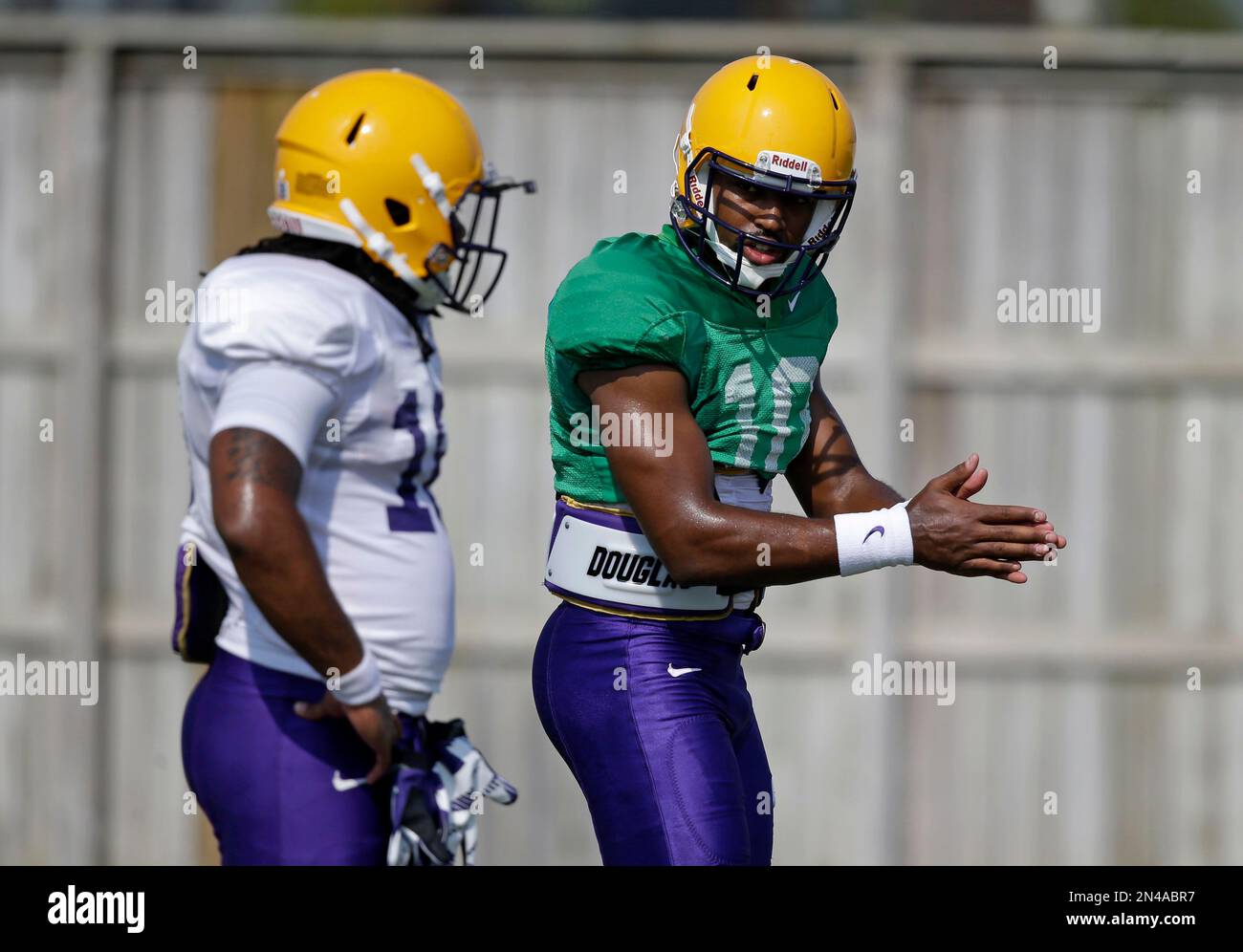 LSU quarterback Anthony Jennings (10) and running back Terrence Magee ...