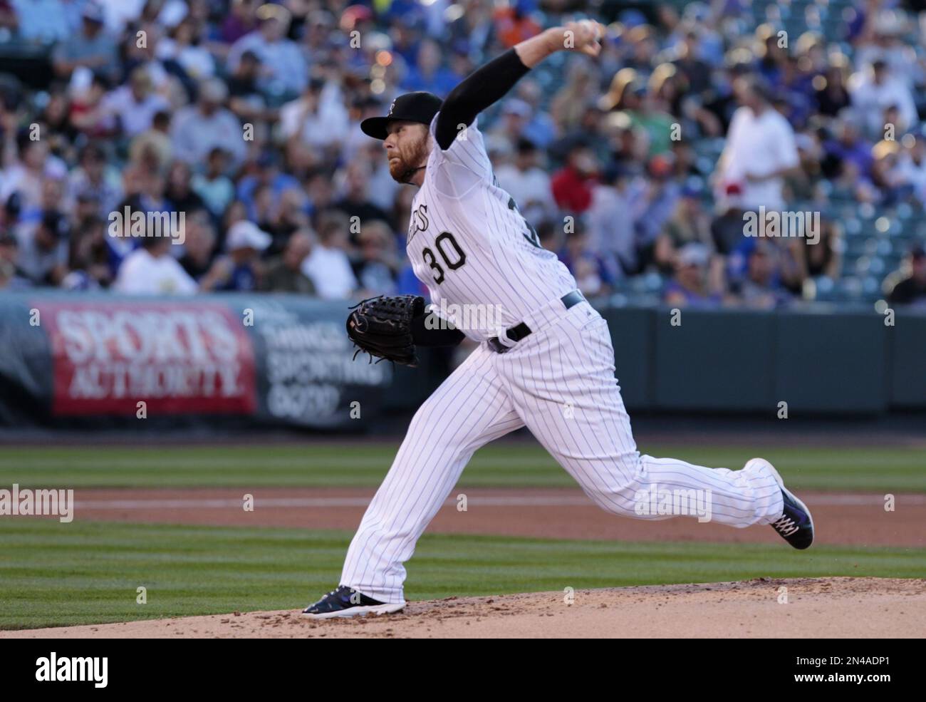 Colorado Rockies starting pitcher Brett Anderson (30) delivers a pitch ...