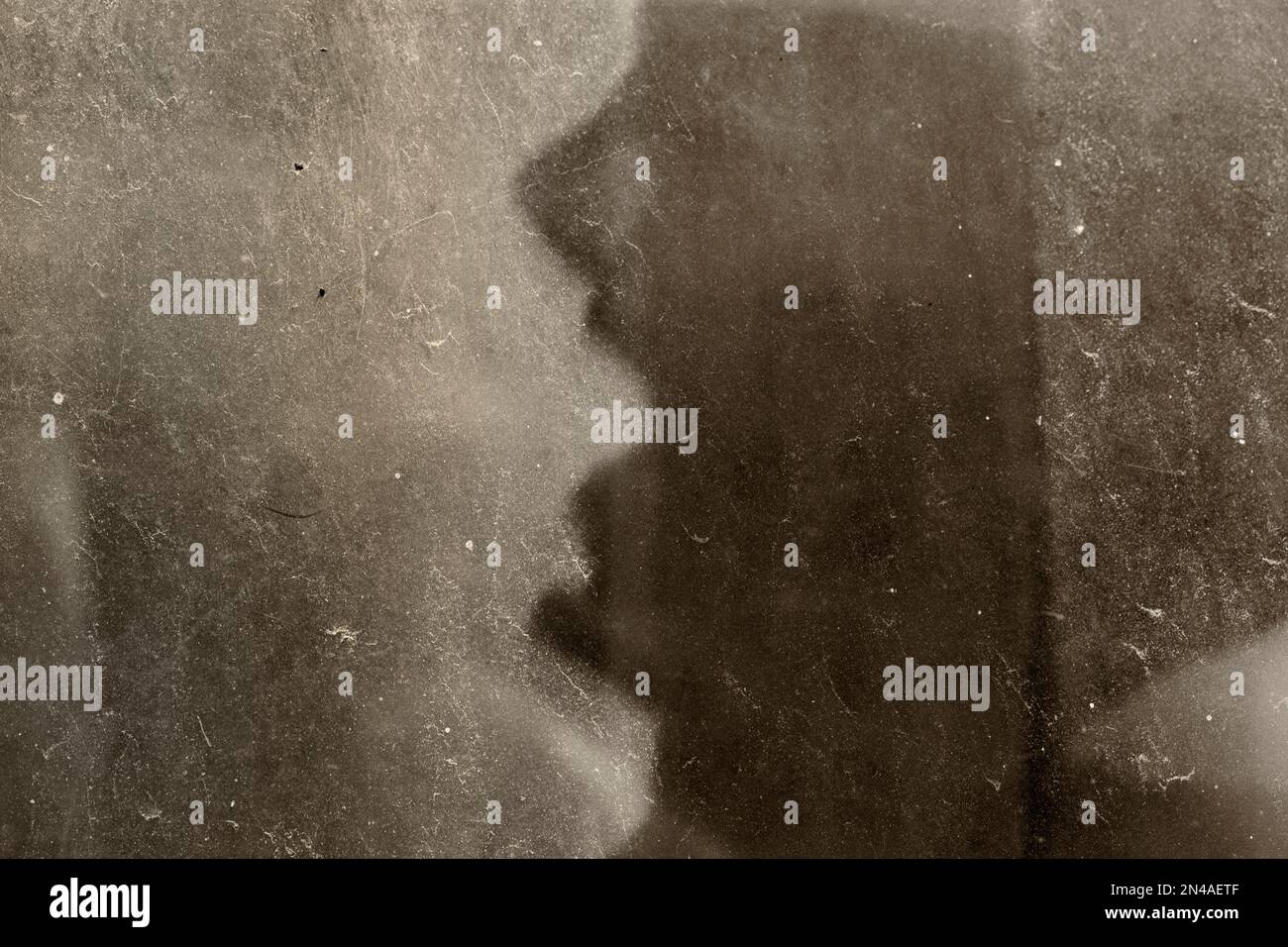 Broken window panes with a human-like screaming face Stock Photo - Alamy