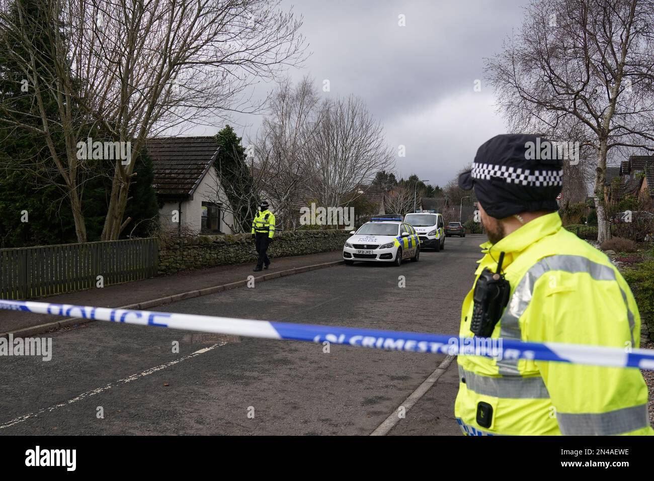 Police officers patrol a cordon in Montgomery Terrace in Gattonside ...