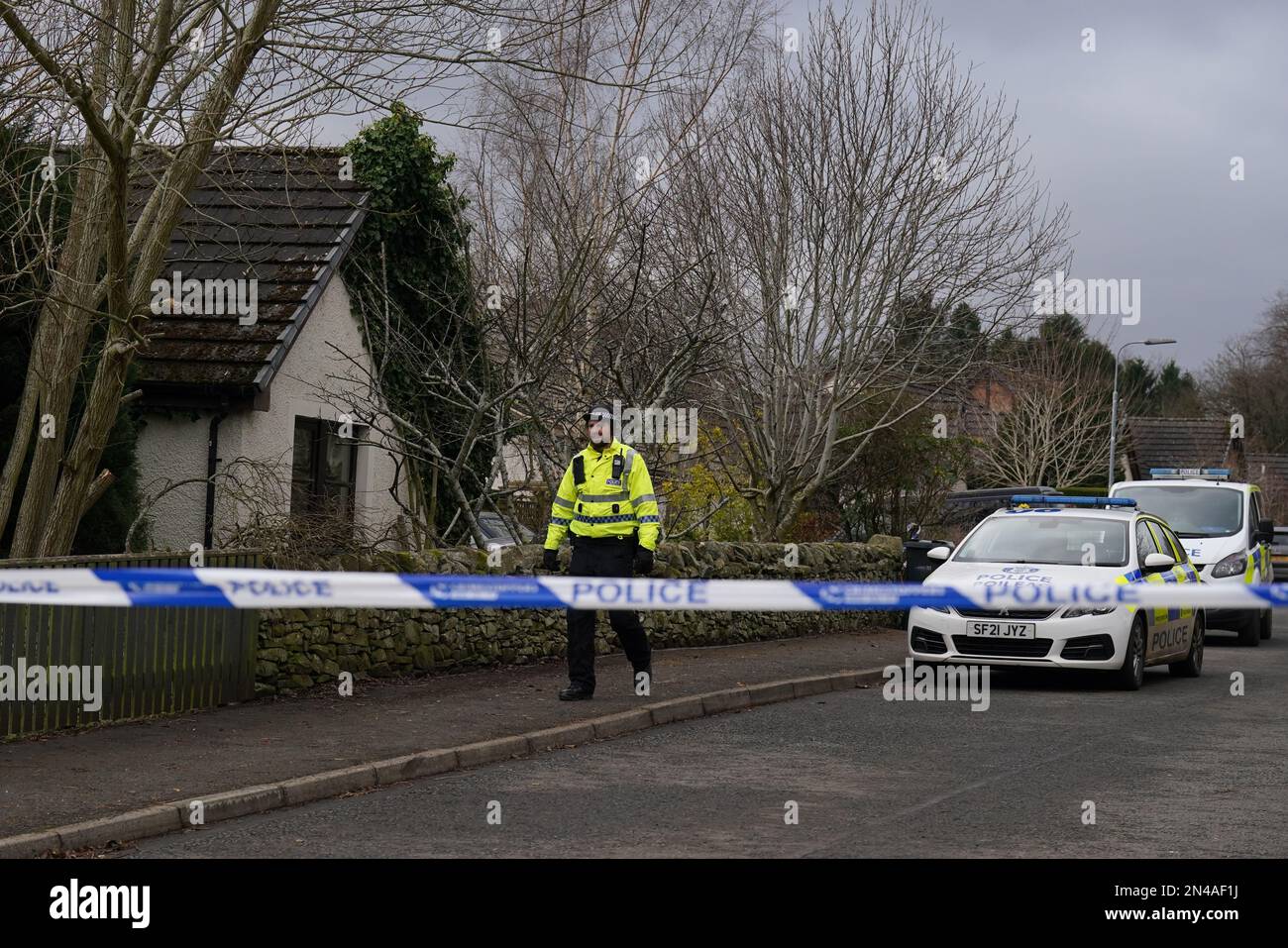 Police officers patrol a cordon in Montgomery Terrace in Gattonside ...