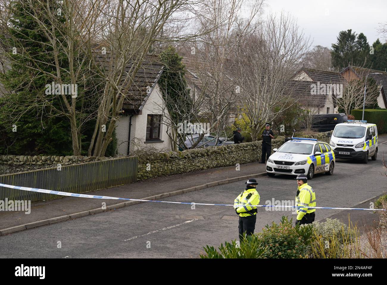 Police officers in the garden of a property on Montgomery Terrace in ...