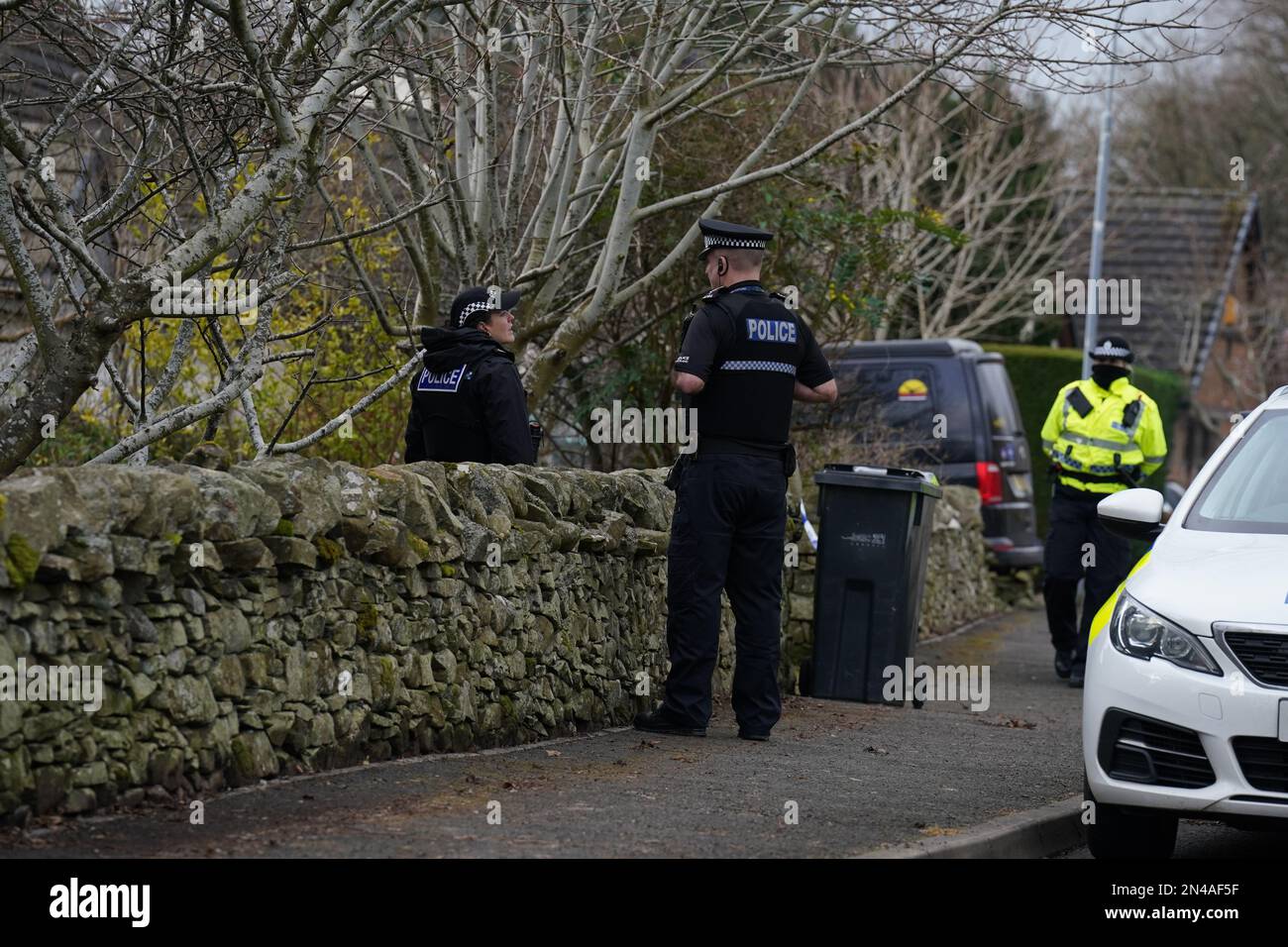 Police officers in the garden of a property on Montgomery Terrace in ...