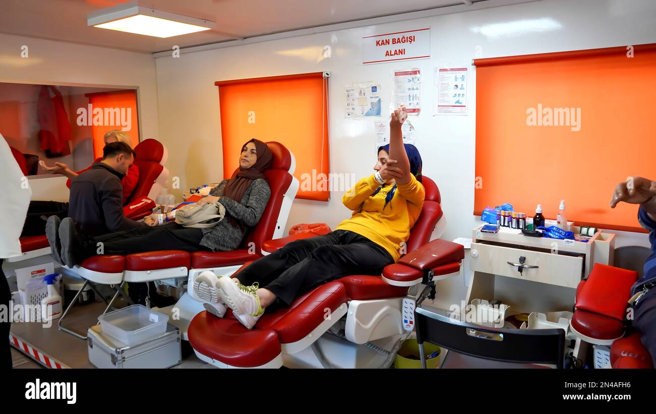 Teenager giving blood hi-res stock photography and images - Alamy