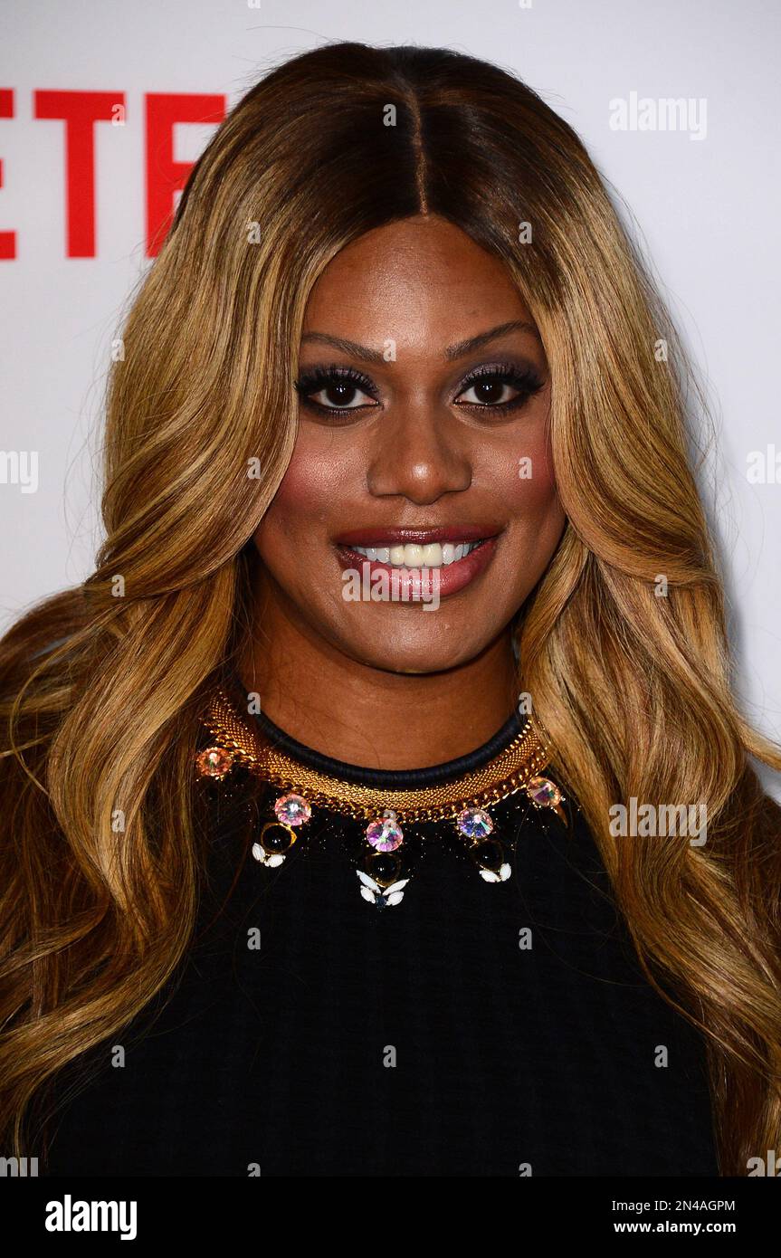 Laverne Cox arrives at a panel discussion with the cast of "Orange Is ...
