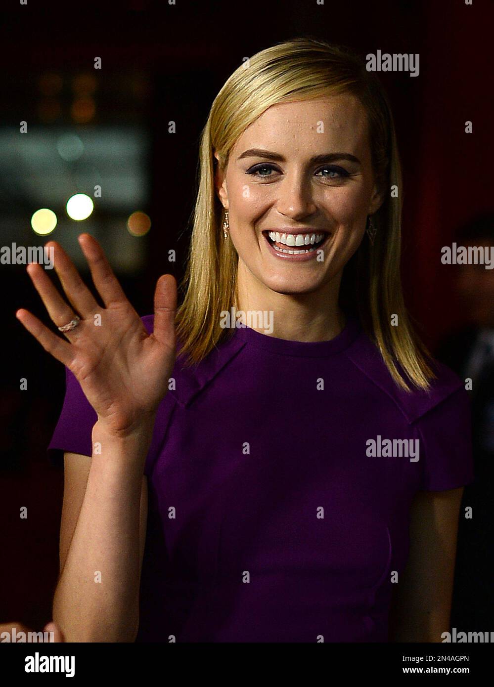 Taylor Schilling arrives at a panel discussion with the cast of "Orange ...