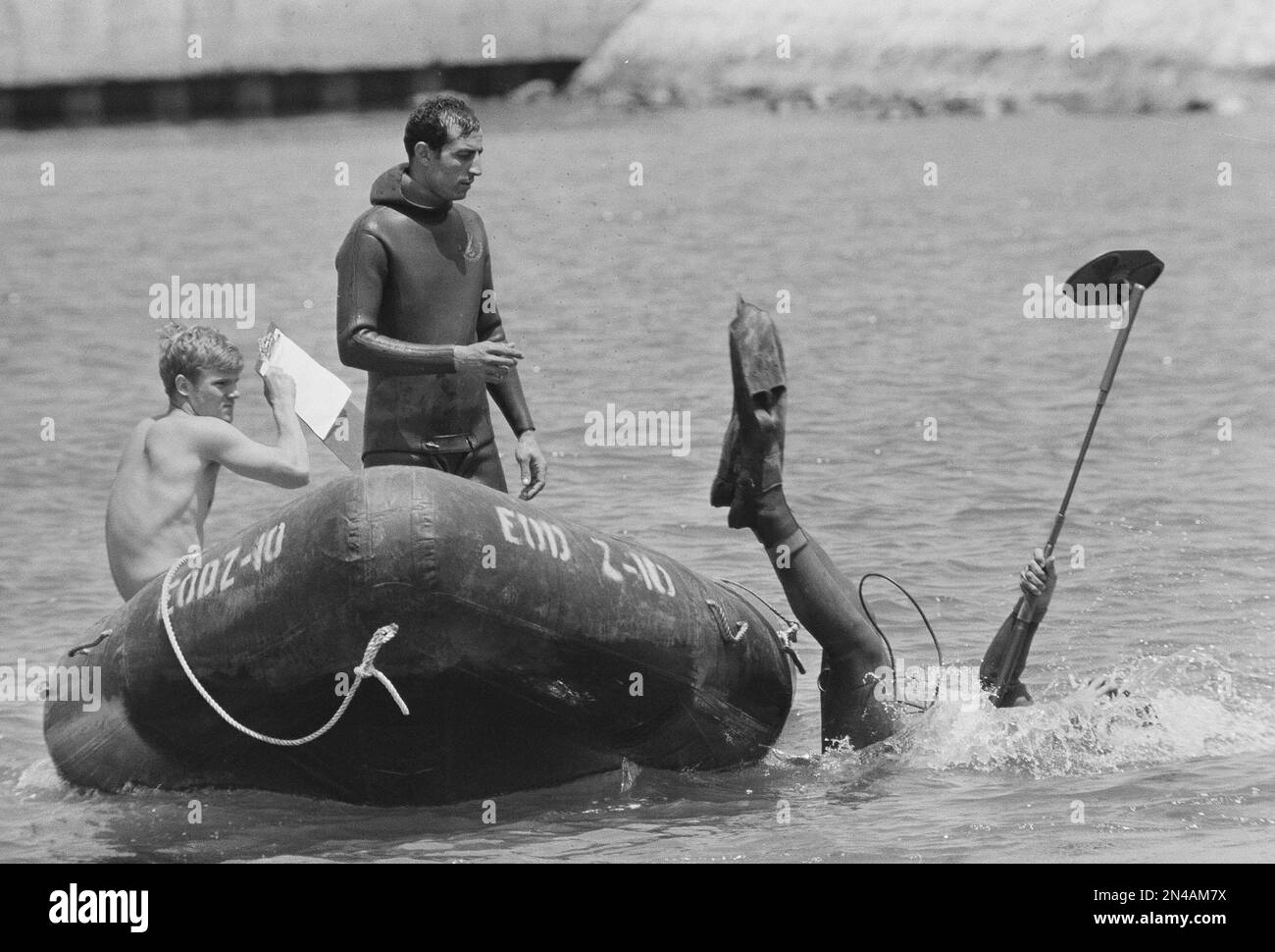 Second Class Aviation Ordinance man, Mark Lundberg, seated, from San ...