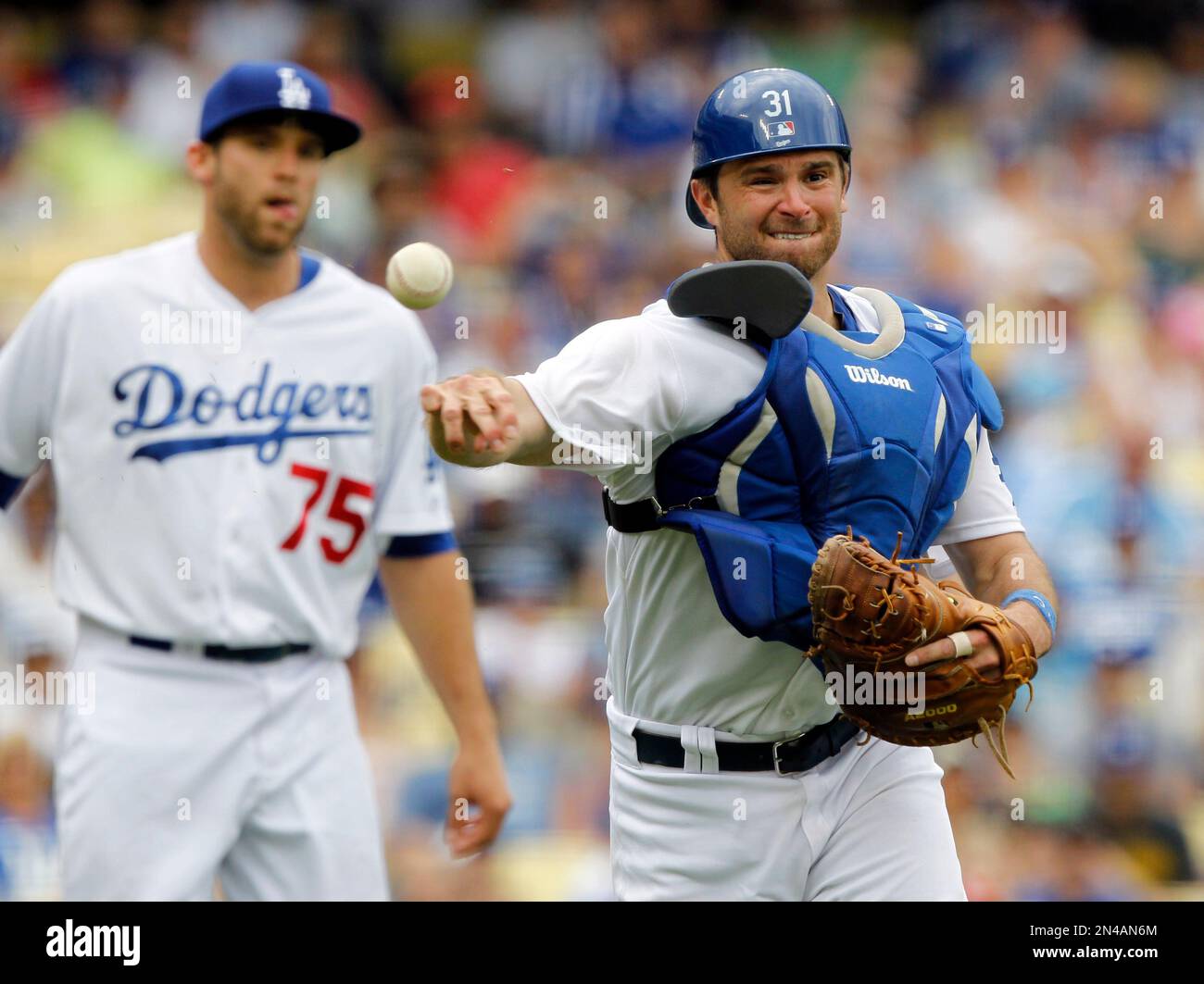Los Angeles Dodgers catcher Drew Butera, right, with relief pitcher ...