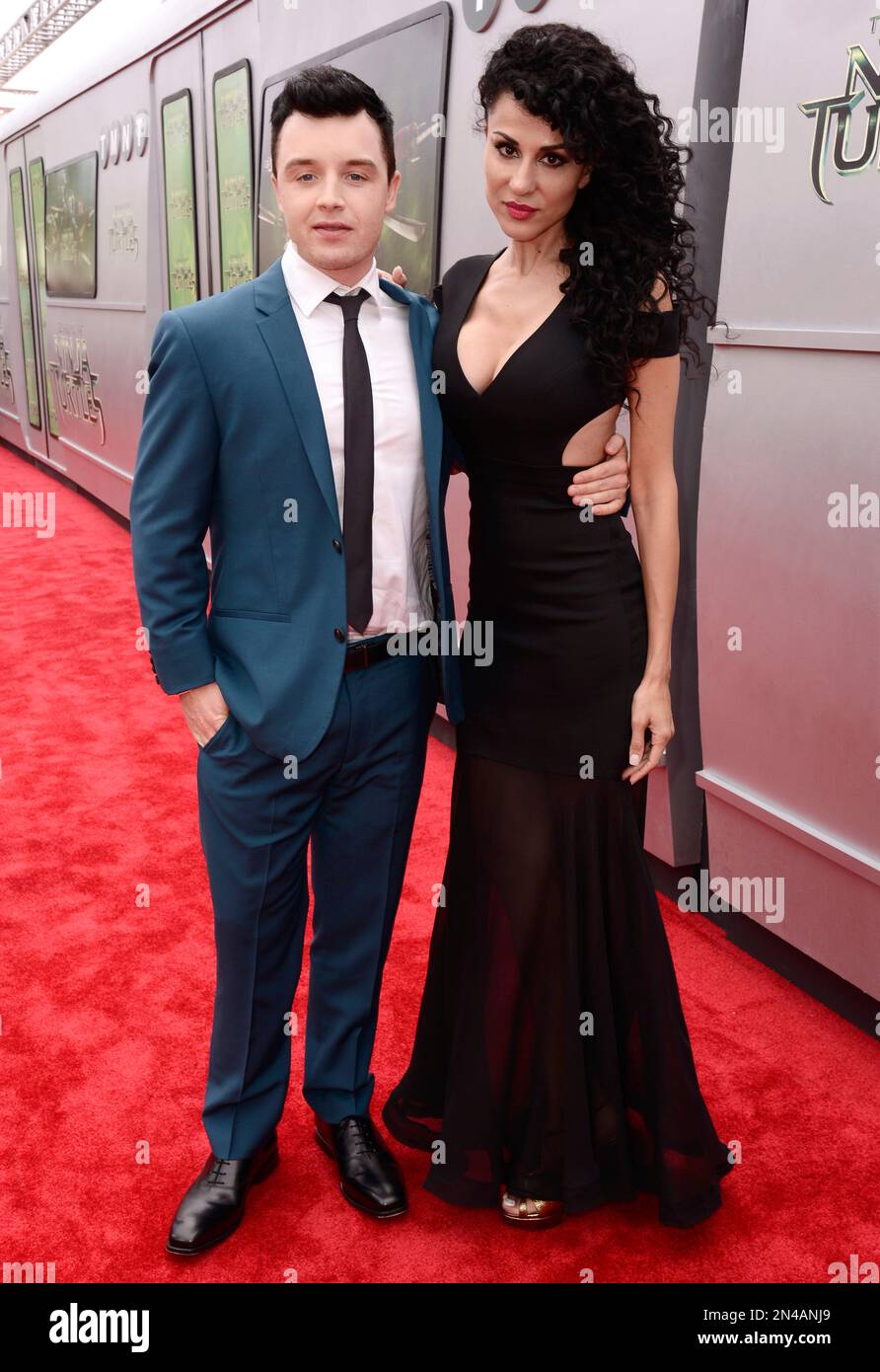 Layla Alizada, left, and Noel Fisher arrive at the Los Angeles premiere ...