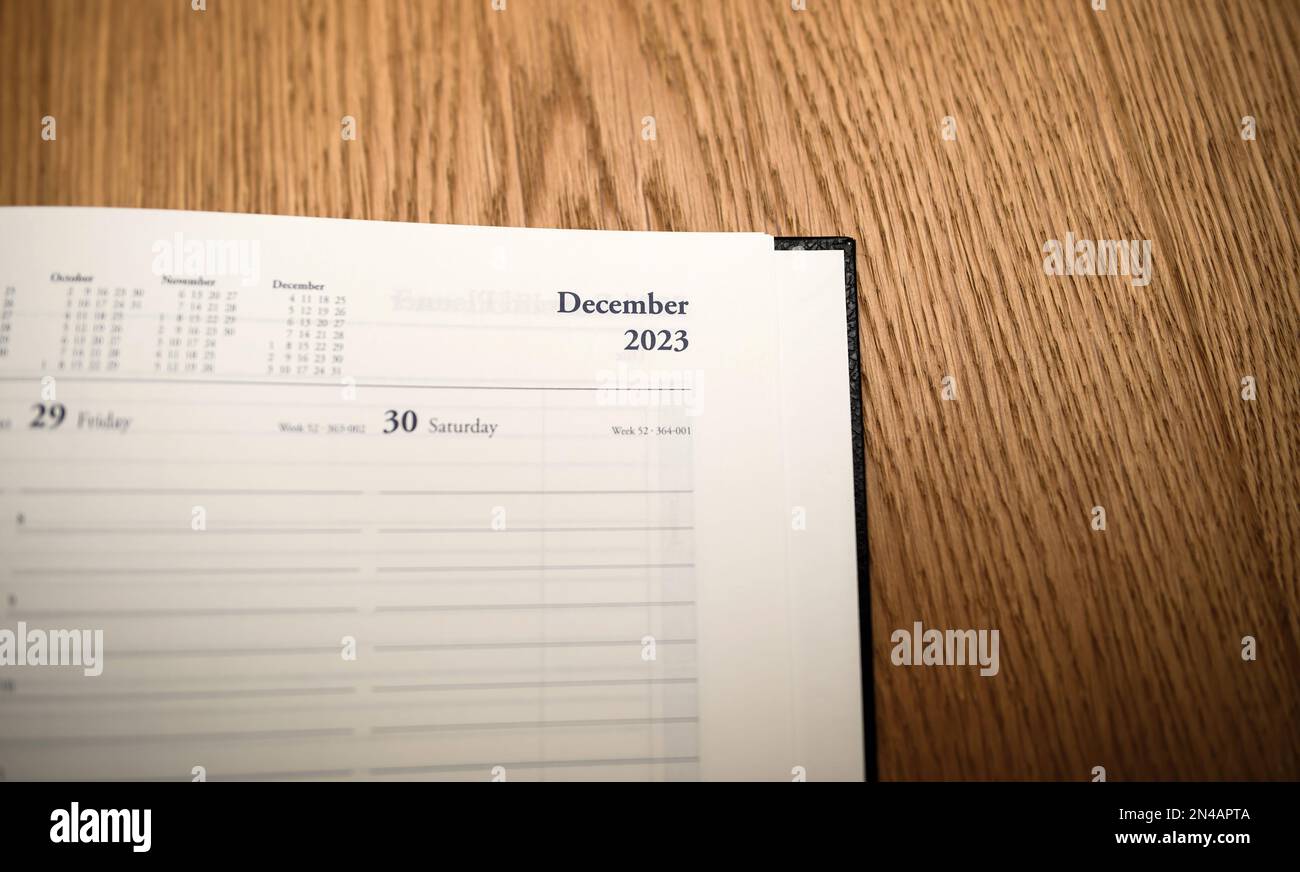 New 2024 year planner agenda with December 2023 empty month - wooden ...