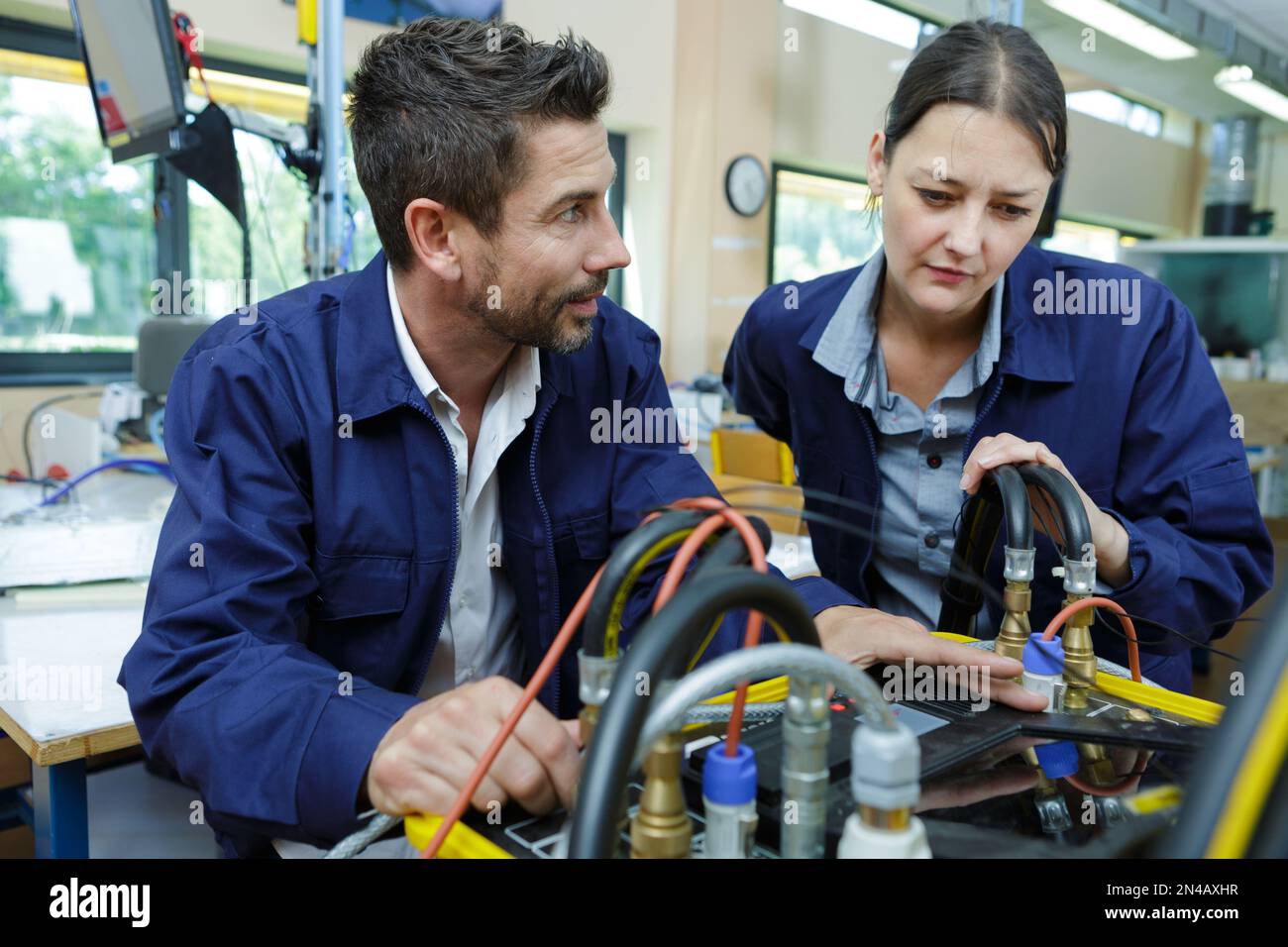 two mechanical engineers at work Stock Photo - Alamy
