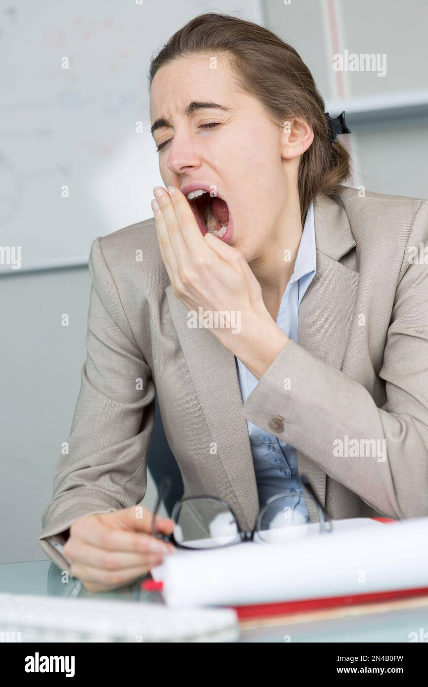 funny looking sleepy business woman Stock Photo - Alamy