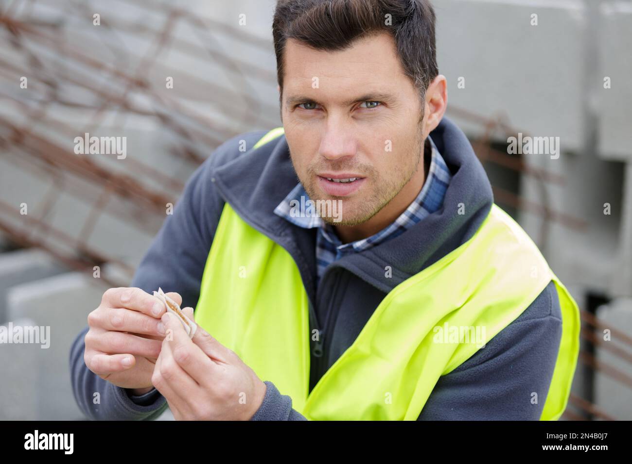 Workman smoking a cigarette hi-res stock photography and images - Alamy