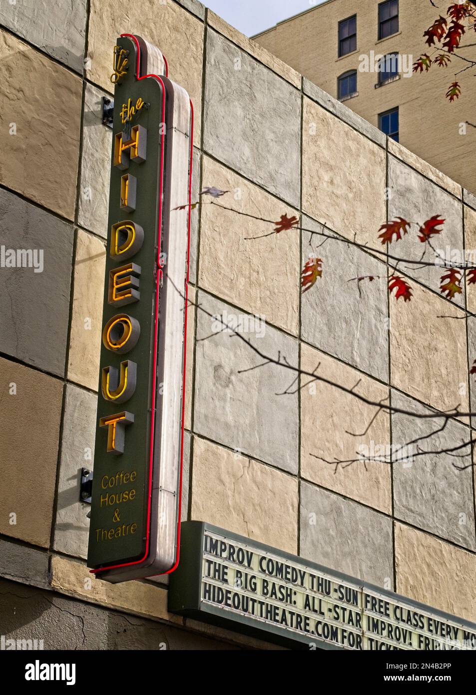 Vertical: Colorful neon sign for the Hideout Theatre on Congress Avenue ...