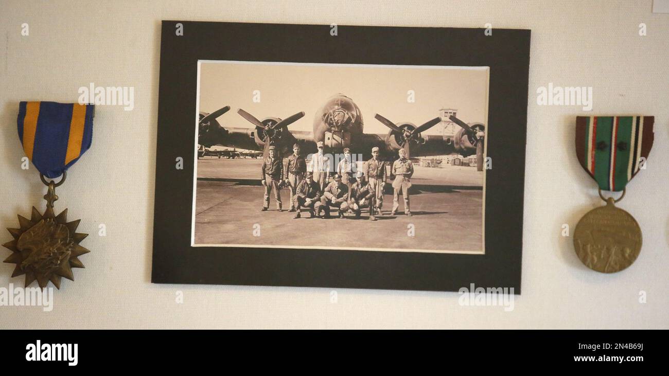 A display showing memorabilia from Dean C. Larson is shown at the Utah ...