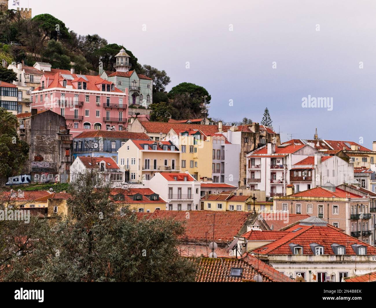 Famous hillside in the Mouraria district in Lisbon, Portugal with the ...