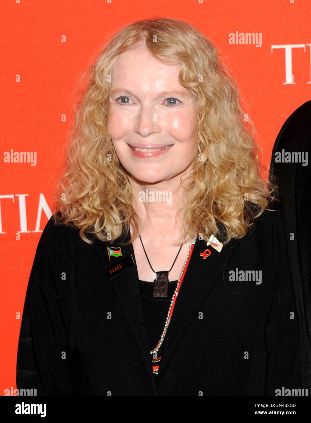 FILE - This April 24, 2012 file photo shows actress Mia Farrow and son ...