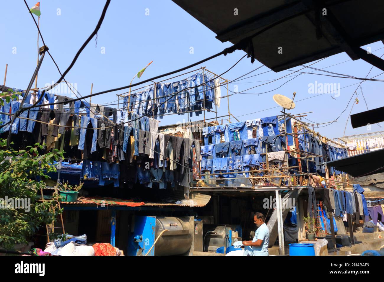 December 21 2022 - Mumbai, Maharashtra in India: People washing clothes ...