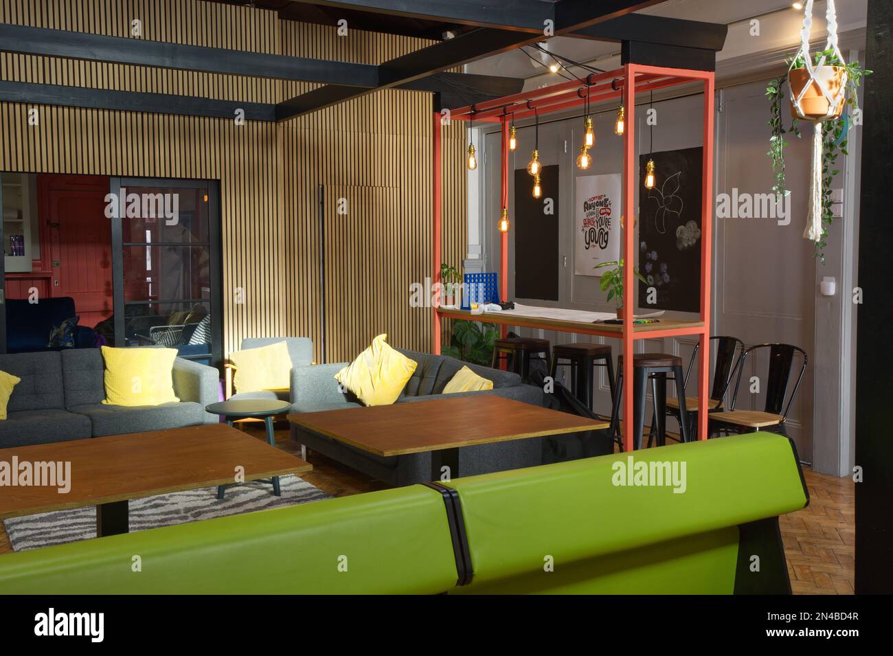 Interior of Church Youth Lounge with easy chairs and tables Stock Photo - Alamy