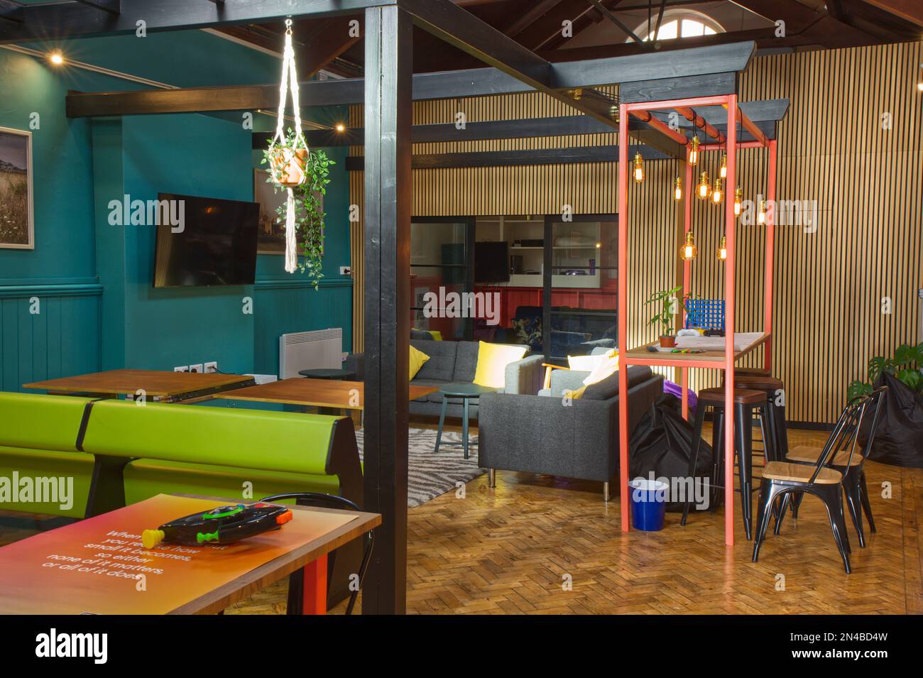 Interior of Church Youth lounge with easy chairs and tables Stock Photo - Alamy