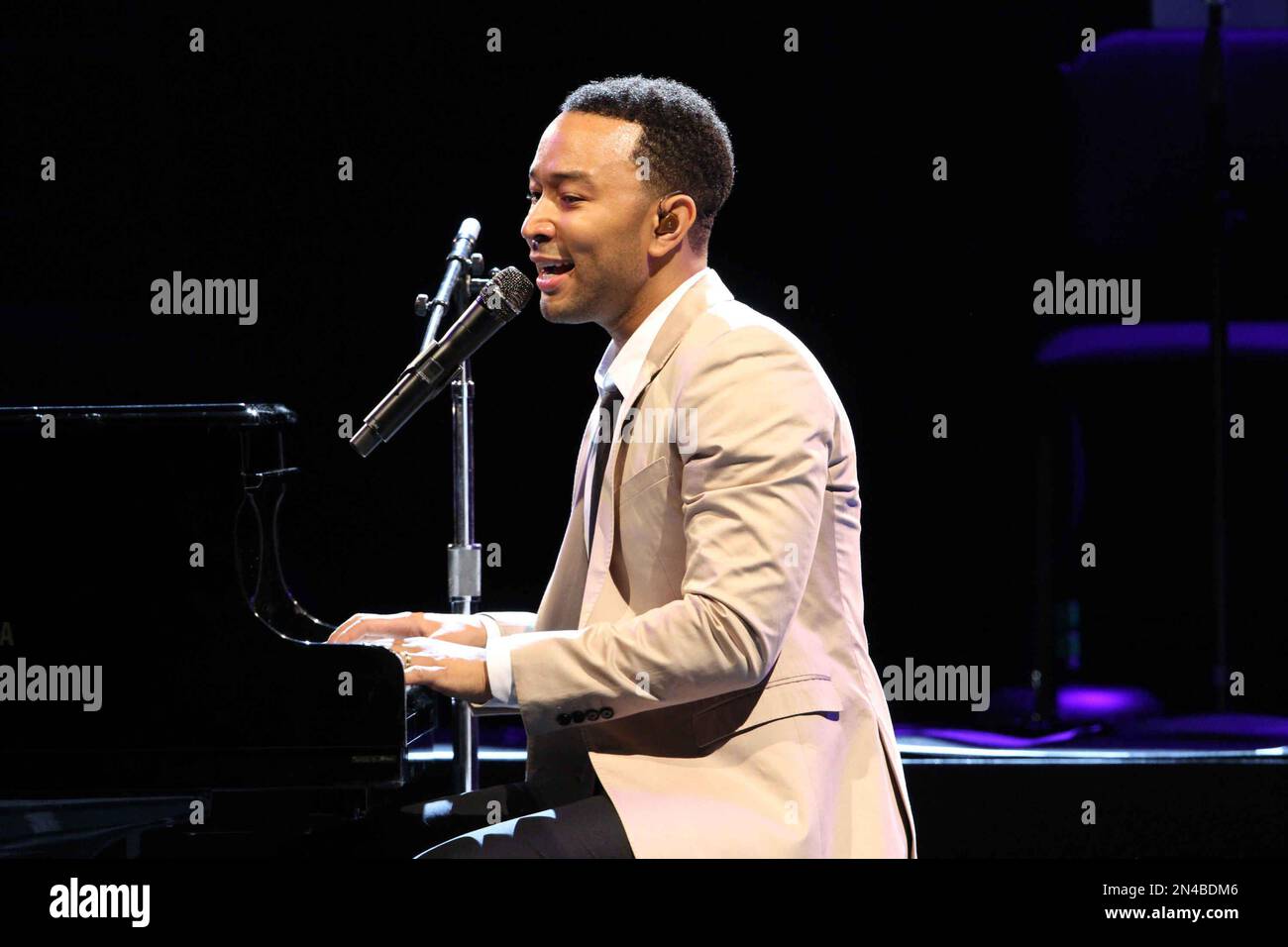 John Roger Stephens as John Legend performing as part of The All of Me ...
