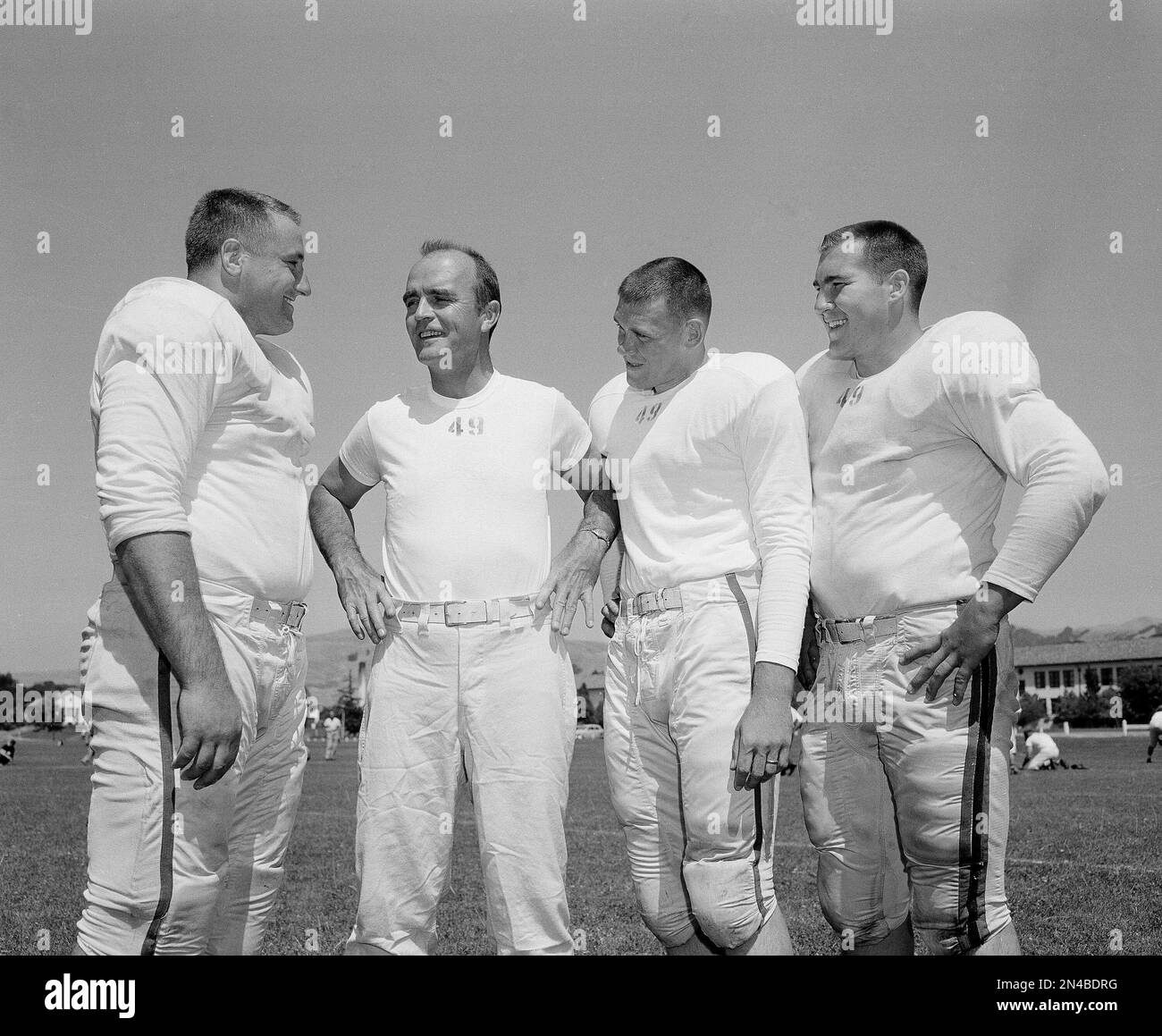 San Francisco 49ers rookies with line coach Phil Bengtson, second from ...