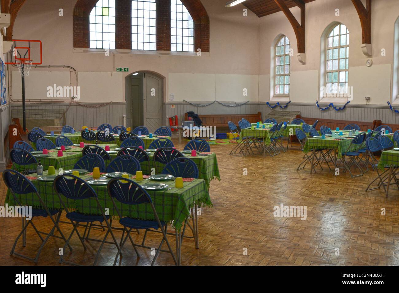 Church Hall. With tables and chairs set up for lunch Stock Photo - Alamy