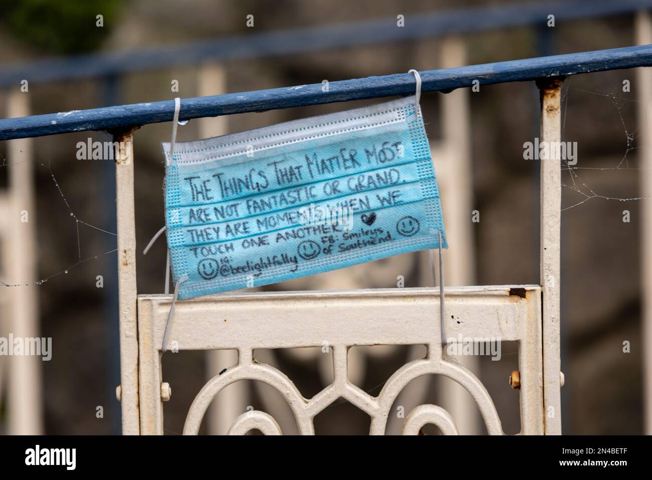 Inspirational message on surgical face mask on a cold morning in ...