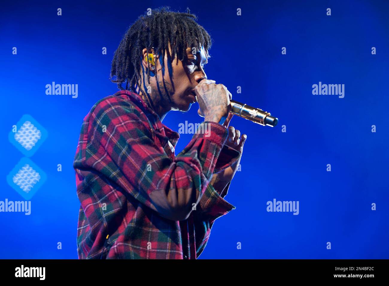 Wiz Khalifa performs on stage at the Molson Amphitheatre during the ...