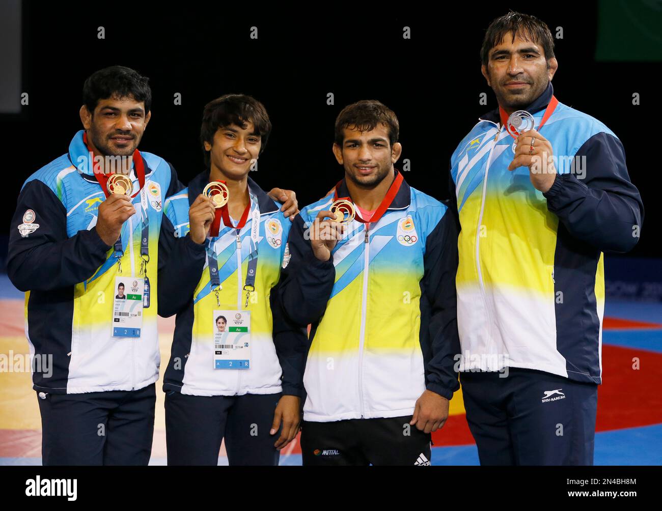 India's wrestling medalists Sushil Kumar, left with gold, Vinesh ...