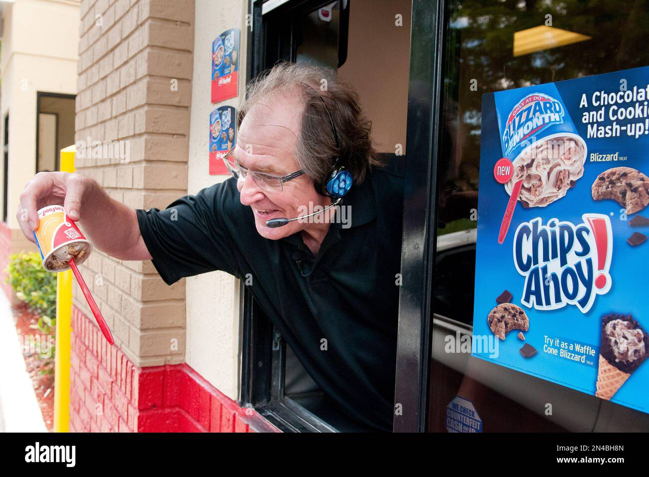 Colorful soccer commentator Ray Hudson surprises fans at the drive thru ...