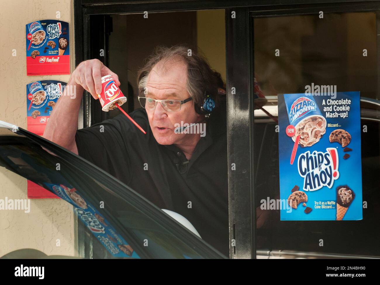 Colorful soccer commentator Ray Hudson surprises fans at the drive thru ...