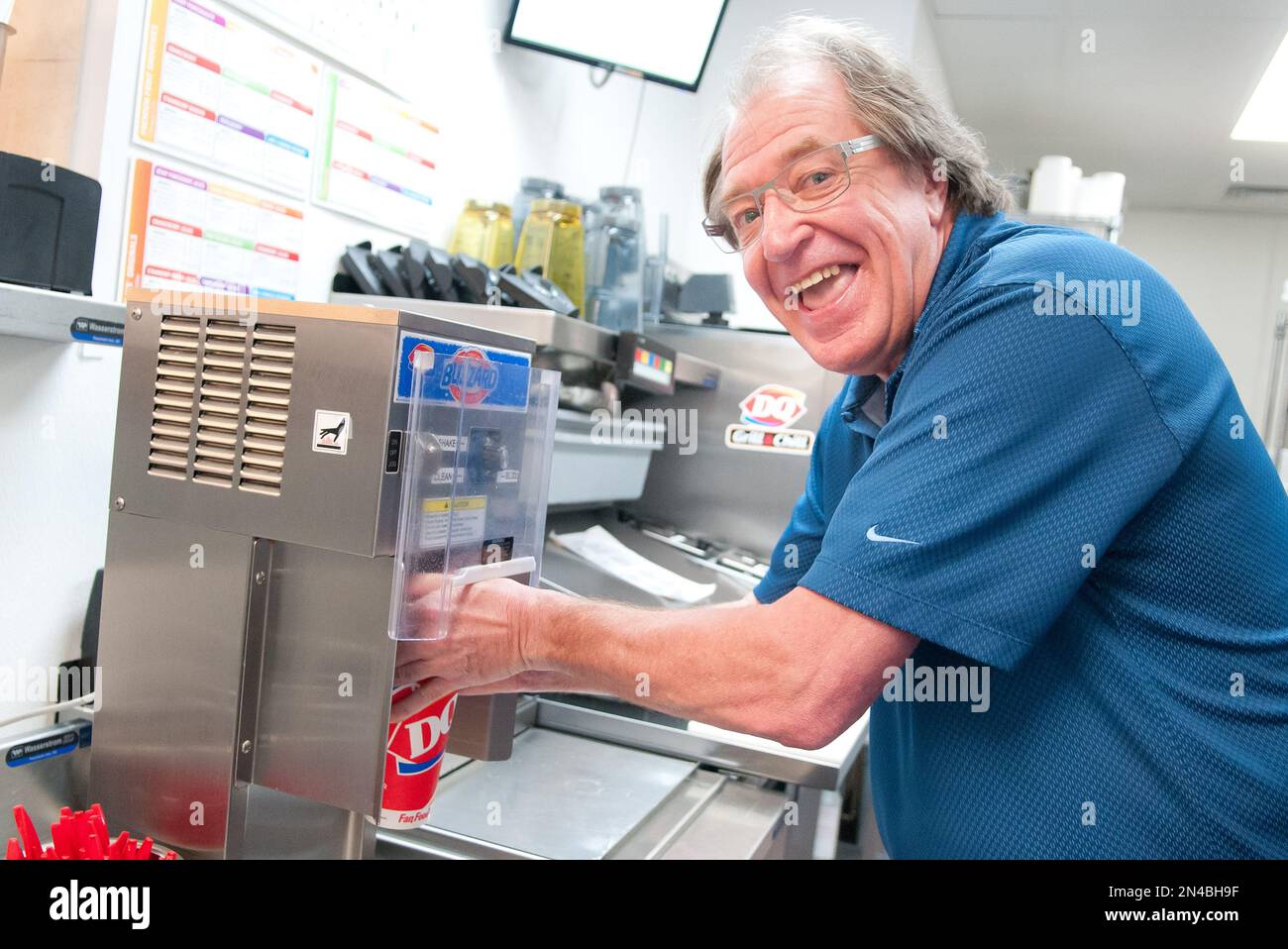 Colorful soccer commentator Ray Hudson surprises fans at the drive thru ...