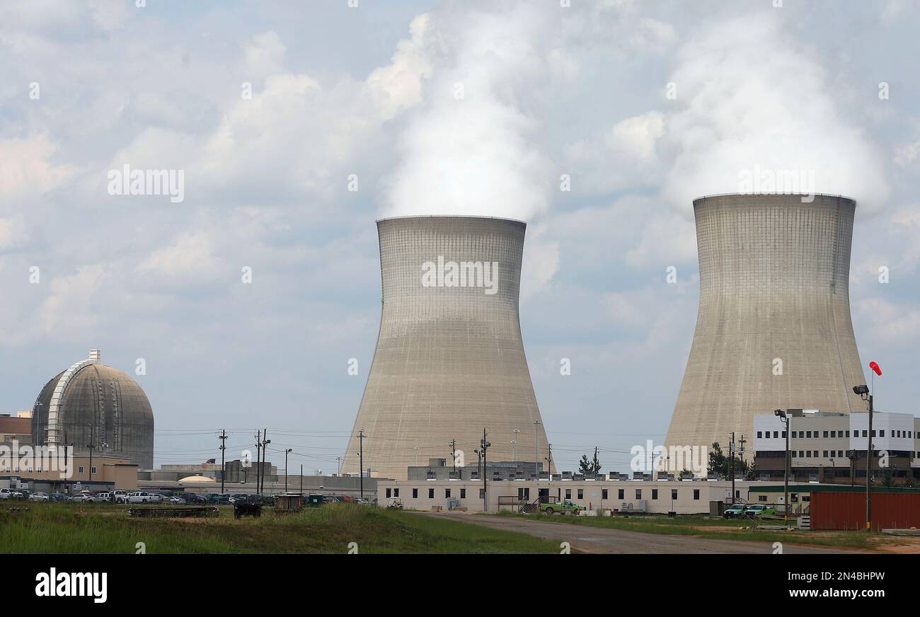 The cooling towers, right, and nuclear reactor containment buildings ...