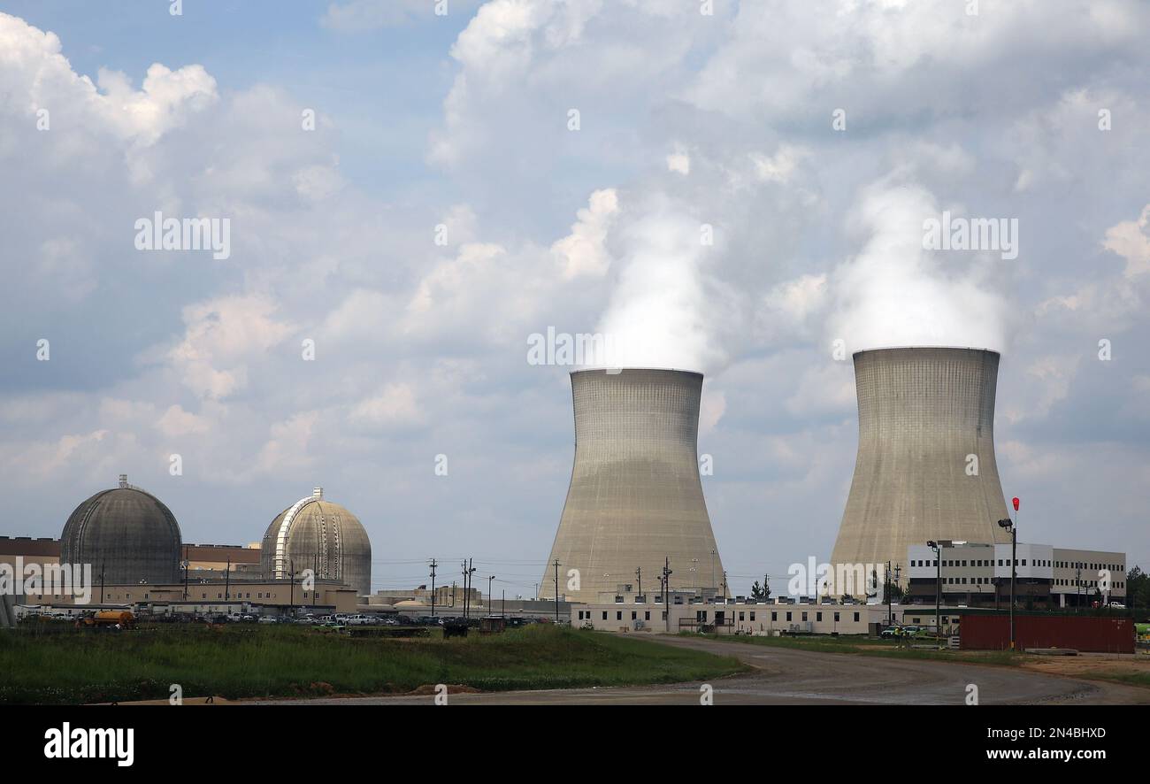The cooling towers, right, and nuclear reactor containment buildings ...