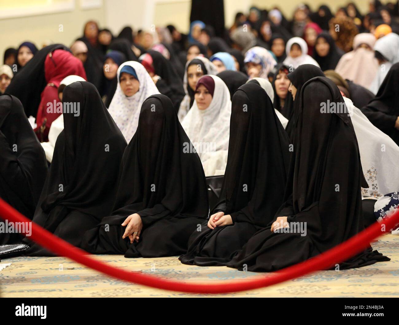 Iraqi Shiite women take part in the Eid al-Fitr prayer in Baghdad, Iraq ...