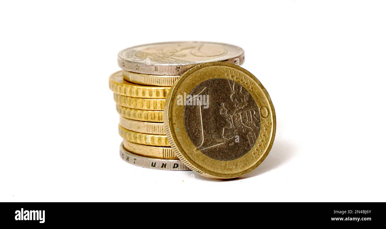 Pile of euro coins on white background, finance theme Stock Photo - Alamy