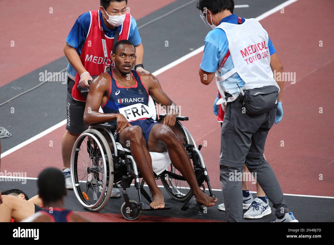 AUG 06, 2021 - Tokyo, Japan: Gilles Biron of France is evacuated on a ...