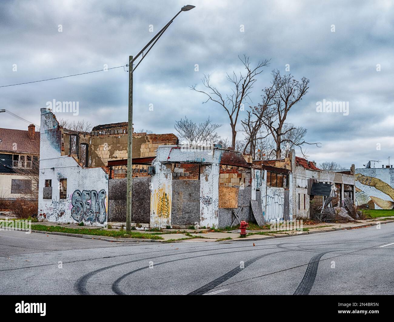 Stores on a desolate street corner in Highlight Park have all been ...