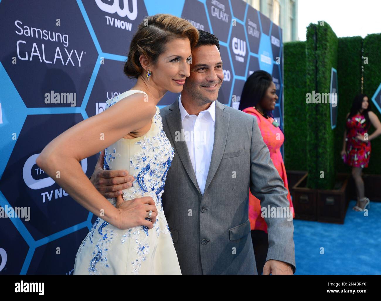 Alysia Reiner, left, and David Alan Basche arrive at the 16th Annual ...