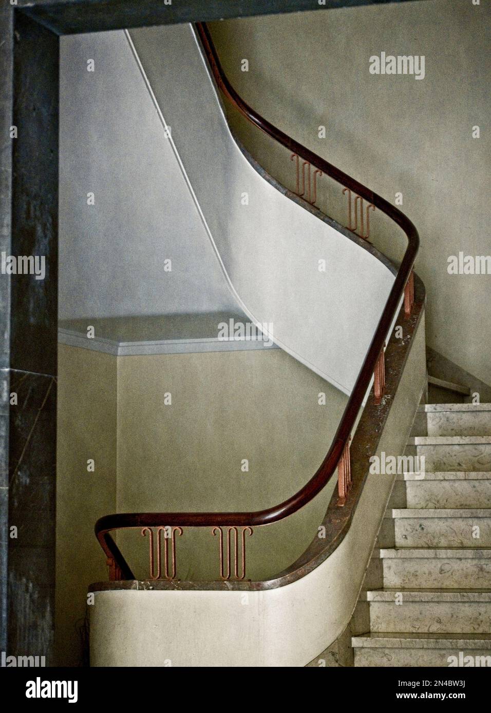 Vertical: Art Deco stairway and railing with marble steps, curved ...
