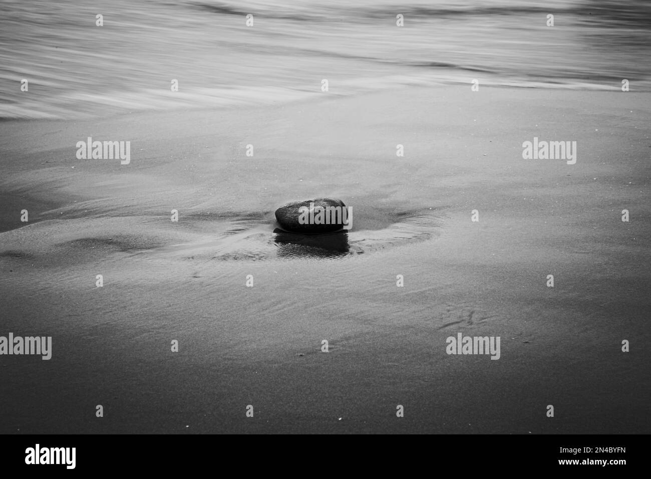 Pebble sandy beach Black and White Stock Photos & Images - Alamy