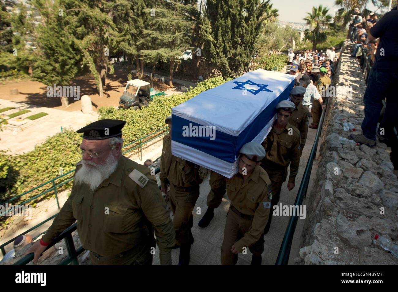 Israeli soldiers carry the coffin of Staff Sgt. Amit Yeori, 20, during ...