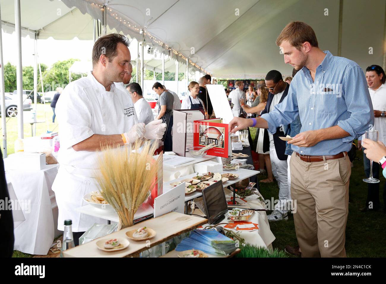 Chef Florian Wehrli serves a guest at the James Beard Foundation's ...
