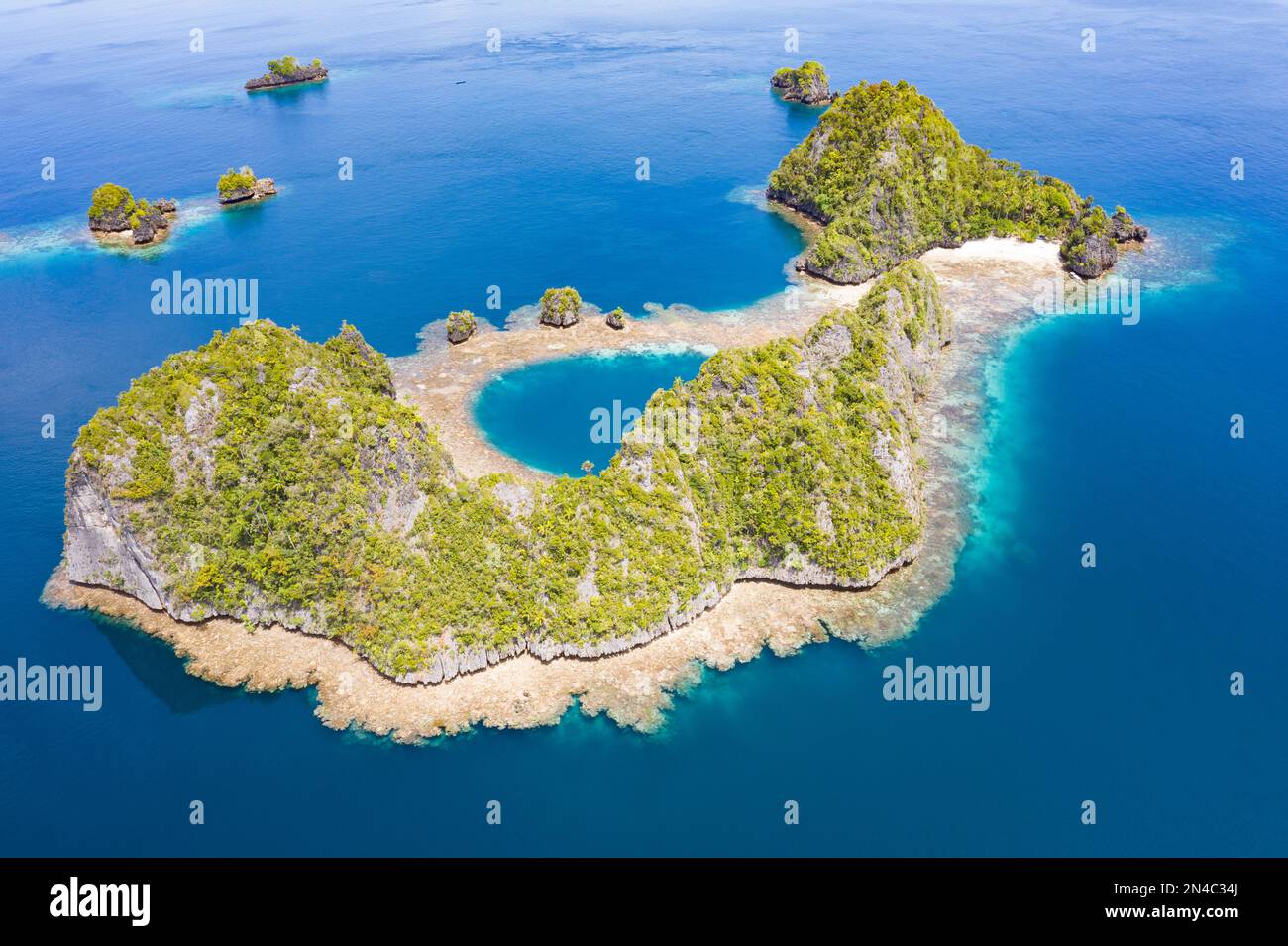 Beautiful limestone islands rise from the Raja Ampat, Indonesia ...