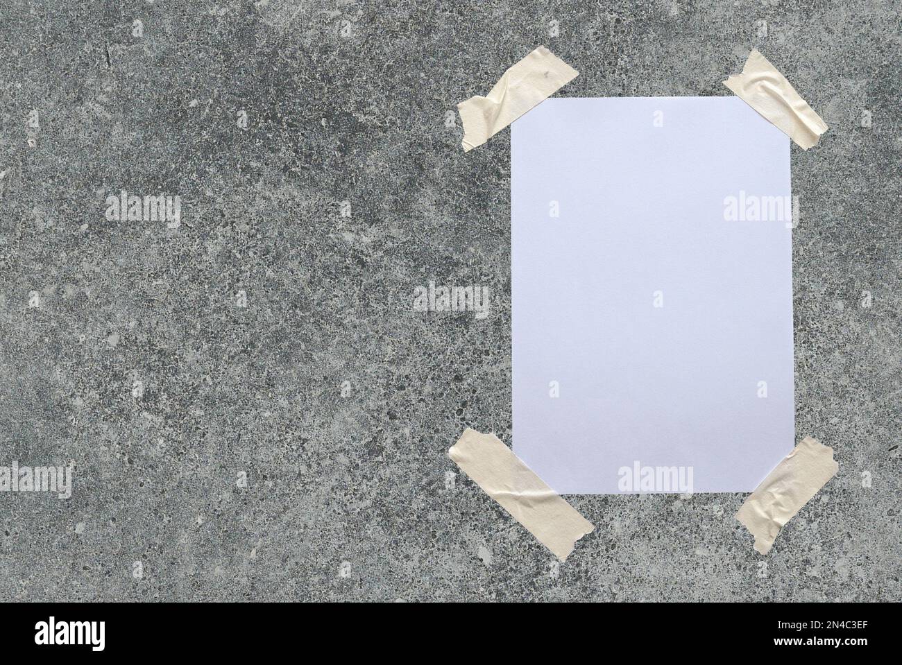 Texture of concrete Blank white paper attached to the old and aged wall ...