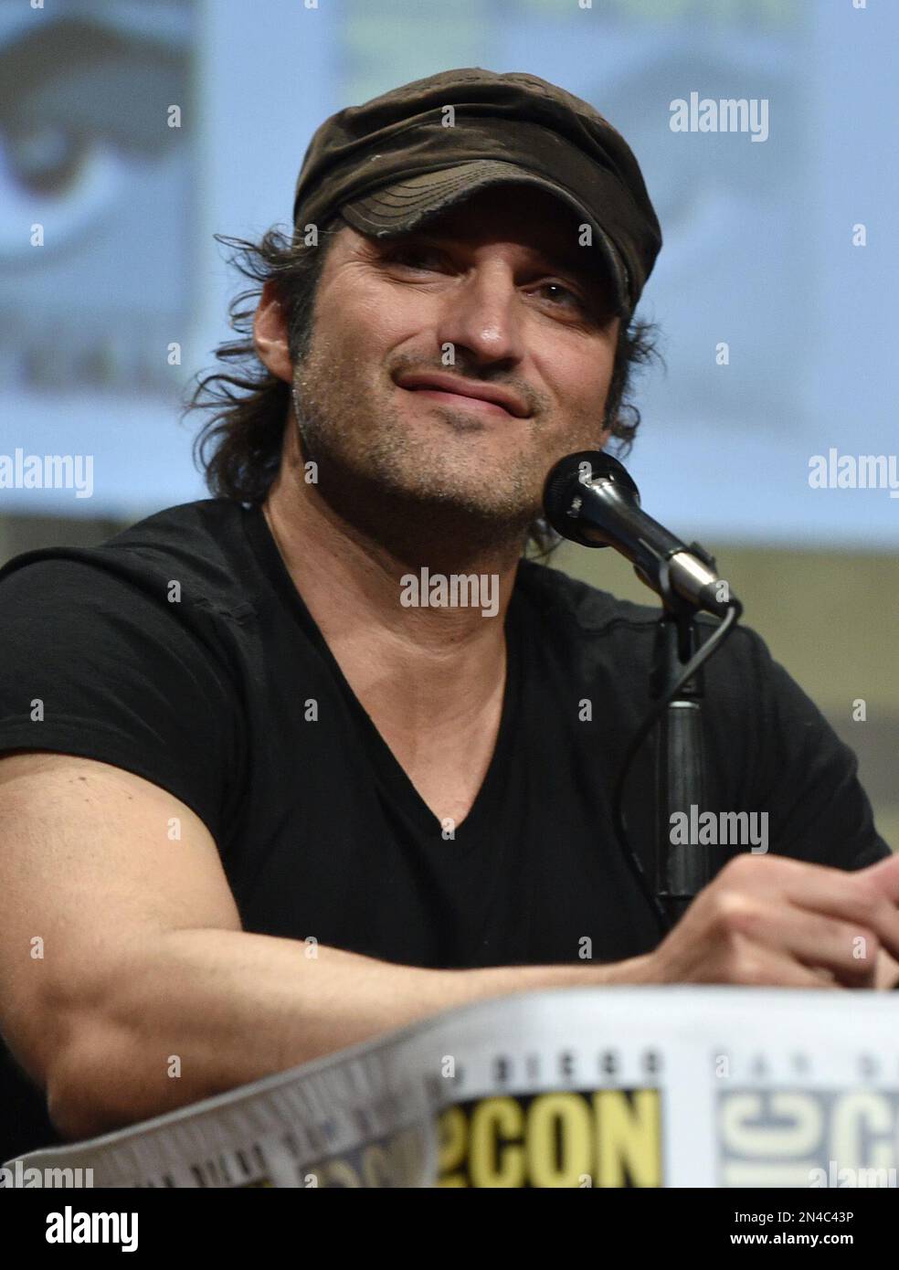 Director Robert Rodriguez speaks on stage at the "Sin City: A Dame to ...