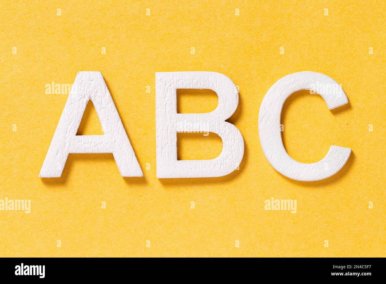 ABC letters of the alphabet, isolated on yellow background Stock Photo ...
