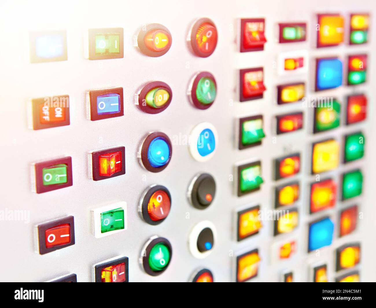 Electric start stop switches on the panel in the store Stock Photo - Alamy
